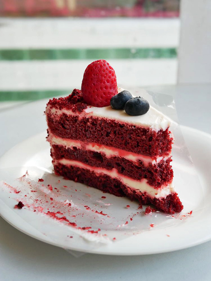 Red velvet cake layered this perfectly is basically showing off, and we're absolutely here for every spectacular bite of it.