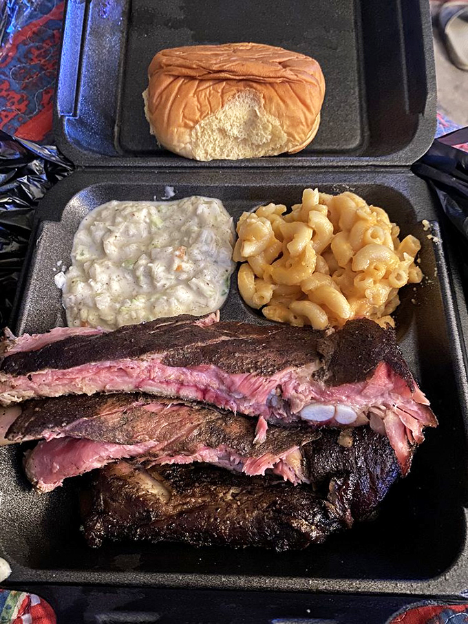 A tray that answers life's most important question: "Why choose one meat when you can have three?" The roll is just there for moral support.