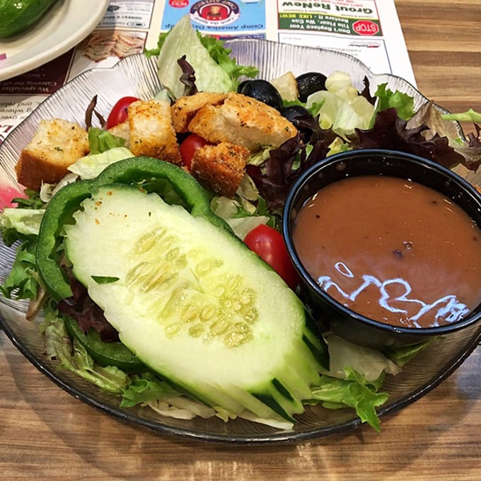 A garden party in a bowl where croutons play the role of delicious party crashers and dressing ties everything together.