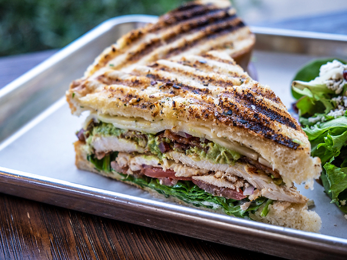 A sandwich architecture masterpiece that deserves its own TED Talk&mdash;layers of goodness pressed between bread that's been kissed by the panini gods.
