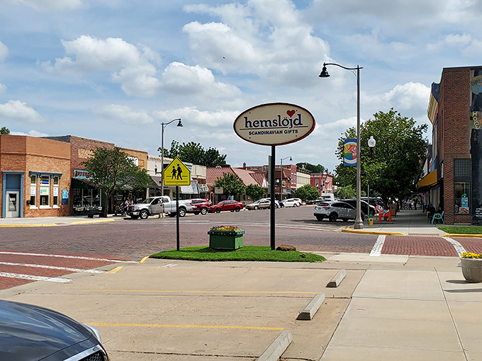 The Hemsl&ouml;jd sign stands like a friendly sentinel, welcoming visitors to a downtown that feels more Stockholm than Sunflower State.