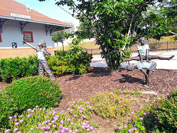 These charming bronze sculptures of children at play add a touch of whimsy to the grounds surrounding Cornelia's famous fruit. 