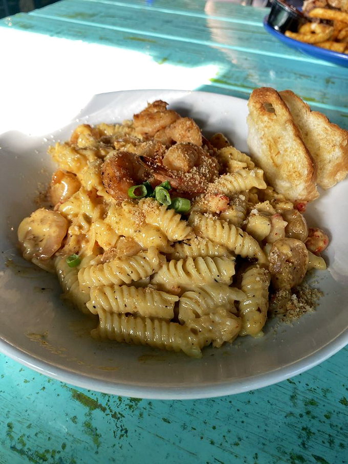 Seafood mac and cheese that elevates comfort food to an art form&mdash;creamy, indulgent, and topped with fresh crabmeat.