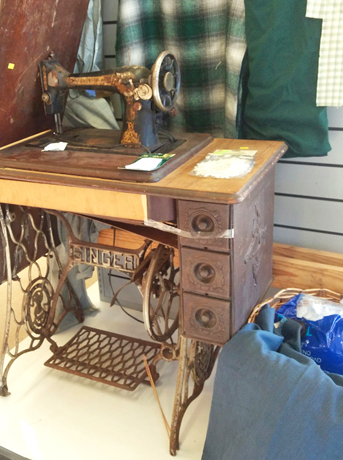 This vintage Singer sewing machine has stories stitched into its metal frame. Once the heartbeat of someone's home, now waiting for its second act.