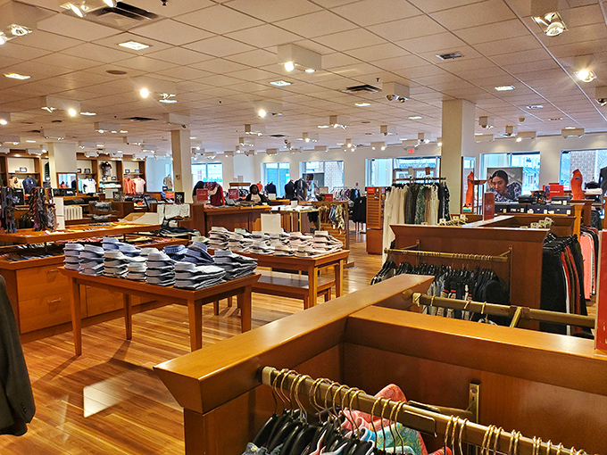 Men's fashion nirvana. The warm wood displays and carefully folded shirts suggest a world where men actually enjoy shopping.