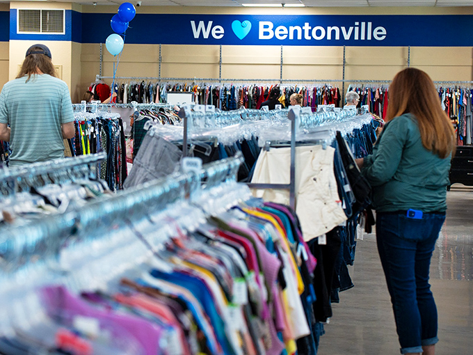 "We love Bentonville" proclaims the wall, as shoppers hunt for that perfect piece to complete their wardrobe puzzle.