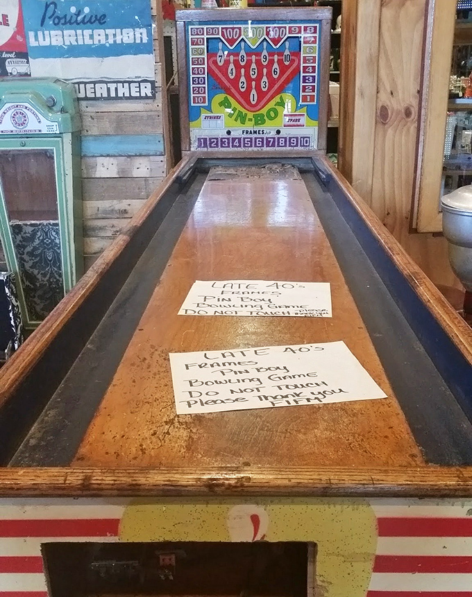 This vintage shuffle alley bowling game isn't just an antique – it's a portal to mid-century American entertainment before screens dominated our attention.