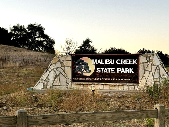 The entrance sign that marks your transition from "Are we there yet?" to "Can we stay longer?" territory.