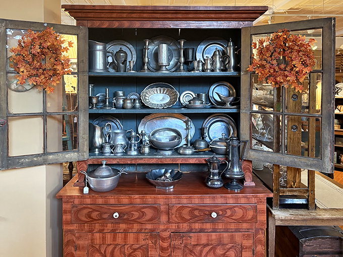 A cabinet of curiosities filled with pewter and possibility. Downton Abbey's downstairs staff would approve of this metallic menagerie.