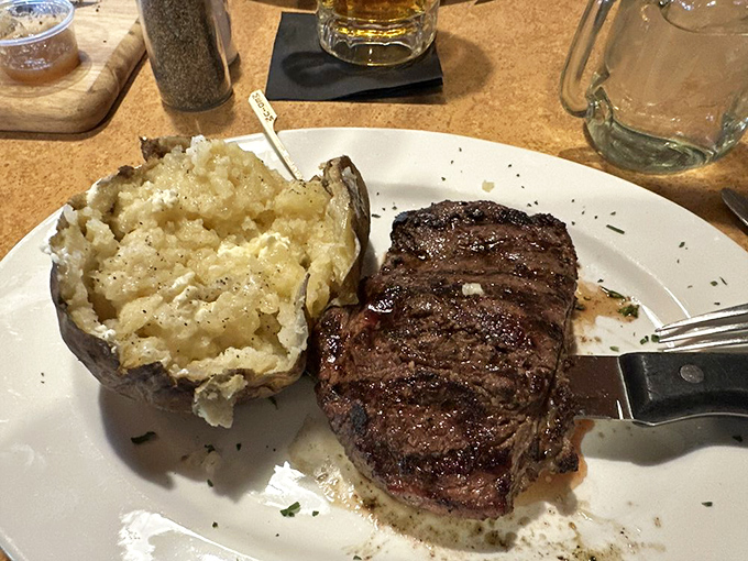 The perfect baked potato alongside a perfectly grilled steak. Sometimes the simplest combinations are the most satisfying.