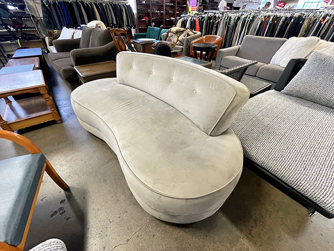 This curved velvet sofa looks like it was plucked from a 1960s Hollywood cocktail party – just add martini and witty conversation.