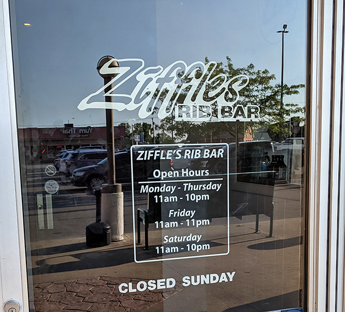 Hours of operation posted clearly&mdash;because knowing when you can get your next rib fix is essential information for mental health planning.