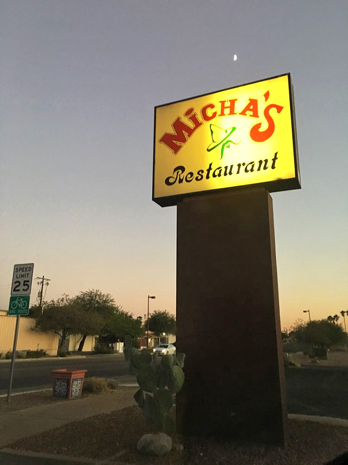 As dusk settles over Tucson, the Micha's sign glows like a North Star for hungry travelers seeking authentic flavors.