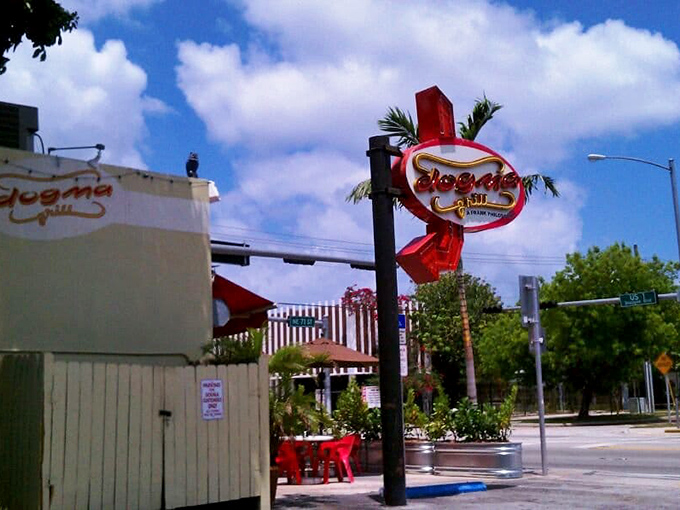 The vintage-style sign serves as a beacon for hungry travelers, promising salvation in the form of perfectly grilled tube meats.