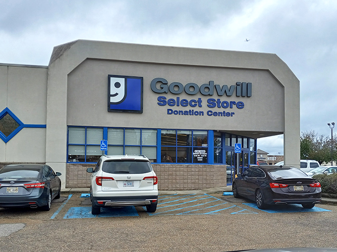 Another view of the storefront with its distinctive blue accents. The accessible parking ensures everyone can join the treasure hunt.