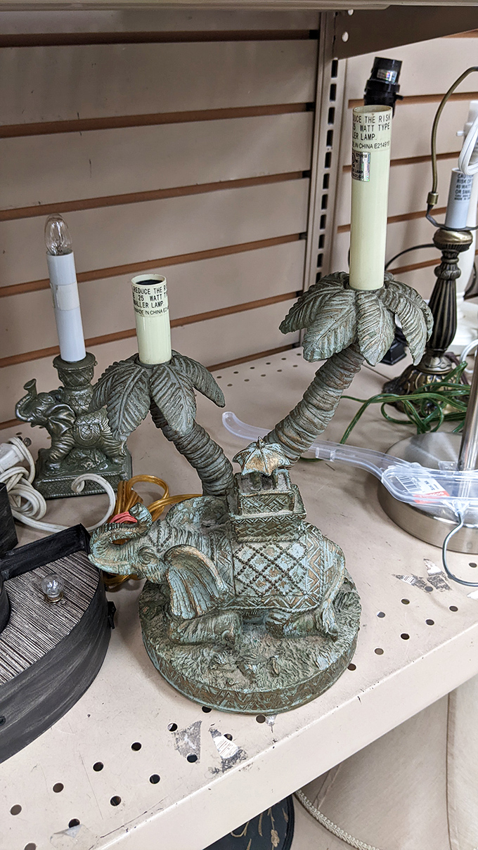 This elephant palm tree lamp isn't just quirky decor—it's the conversation starter your guest room desperately needs. Florida kitsch at its finest.