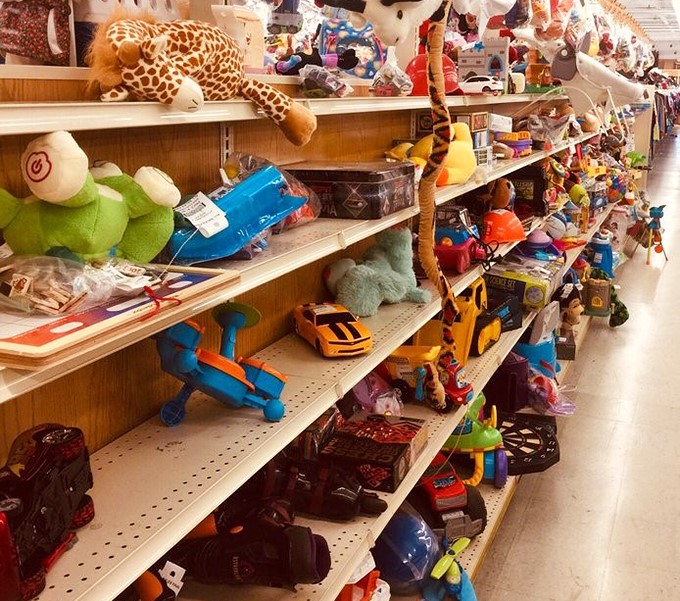 Stuffed animals and toys line the shelves like a Noah's Ark of childhood memories waiting for second chances.