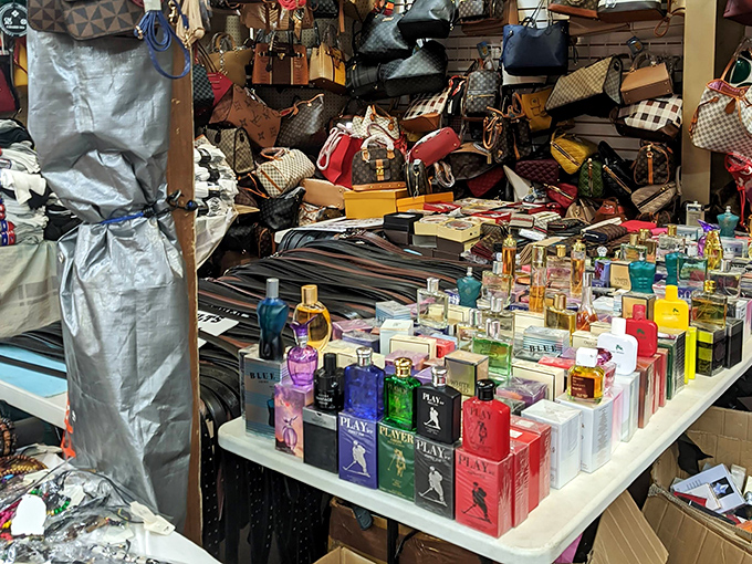 The perfume booth—where you can smell like a million bucks for twenty dollars, proving luxury doesn't always need a fancy department store.