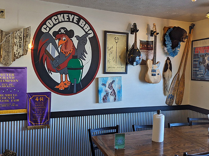 The wall art tells you everything&mdash;this place takes barbecue seriously but itself lightly. That pirate rooster mascot has seen things you wouldn't believe.