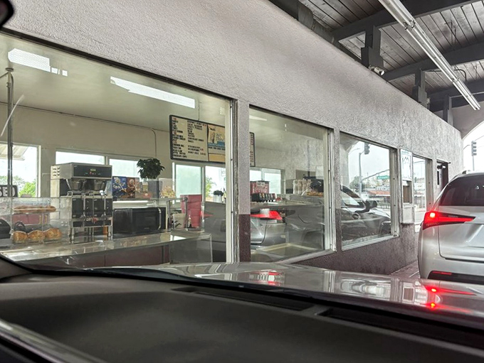 The drive-through window: where dreams come true and diets go to die, all without leaving your car.