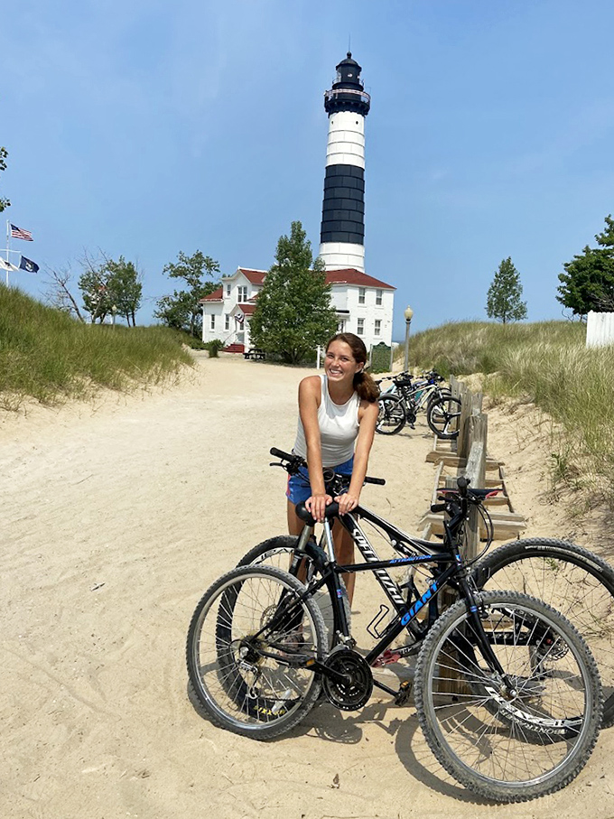 Some visitors arrive by bicycle, making the sandy trek more manageable. The lighthouse seems to say, "Congratulations, you made it!"
