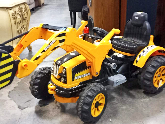 Every child's construction fantasy awaits. This yellow excavator costs less than two movie tickets and creates memories that last much longer.