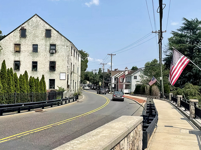 Stone buildings whisper secrets of simpler times when communities gathered around mills and genuine conversations.