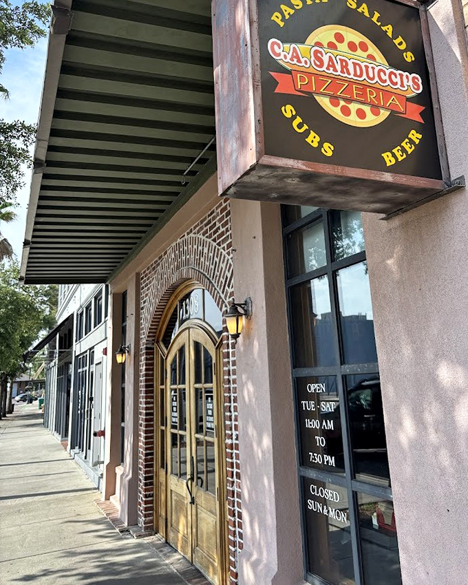 CA Sarducci's brick archway frames decades of Italian-American tradition served with coastal Gulf charm.