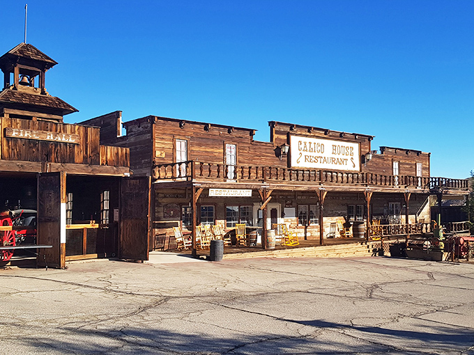 Calico's weathered wooden buildings rise from desert sands like a Wild West movie set.