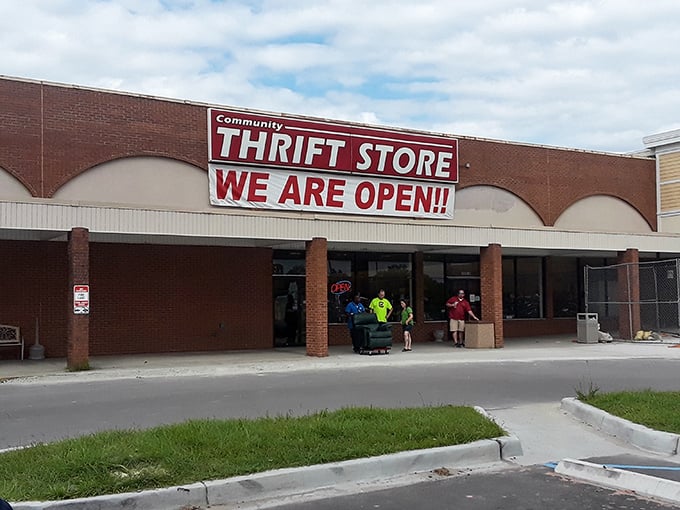 Community Thrift announces itself with no-nonsense clarity. "WE ARE OPEN!!" is the understatement of the century.