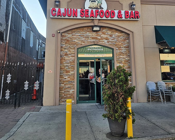 The stone facade and warm lighting hint at the Cajun spice party waiting inside this northern New Jersey seafood adventure.