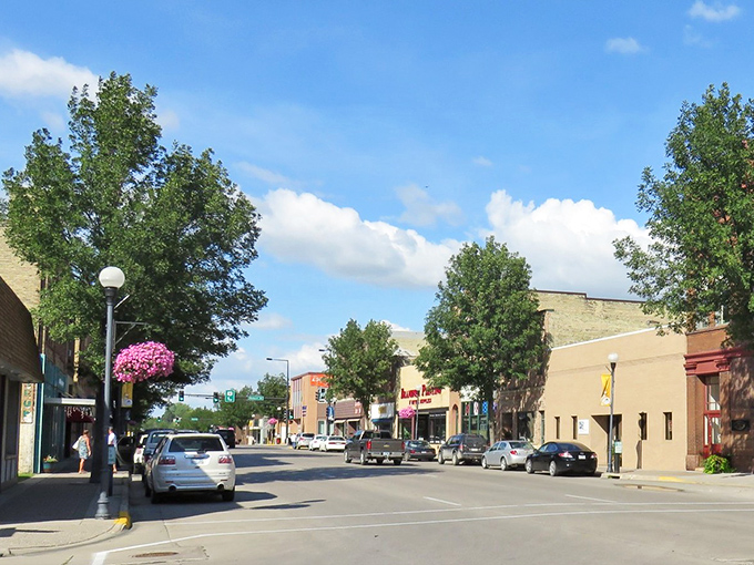 Summer sunshine bathes Crookston's downtown in golden light, highlighting a community where your budget goes surprisingly far.