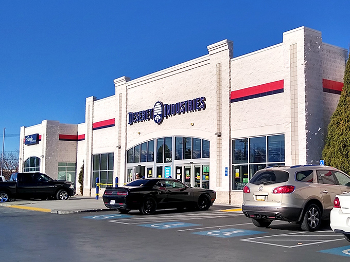 Deseret Industries' distinctive white building with red trim – Utah's thrift institution stands ready for treasure hunters.