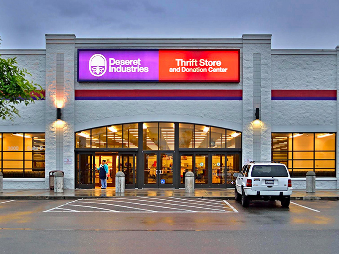 Deseret Industries' modern facade glows with welcome. That arched entrance leads to one of Sacramento's most organized thrift adventures.