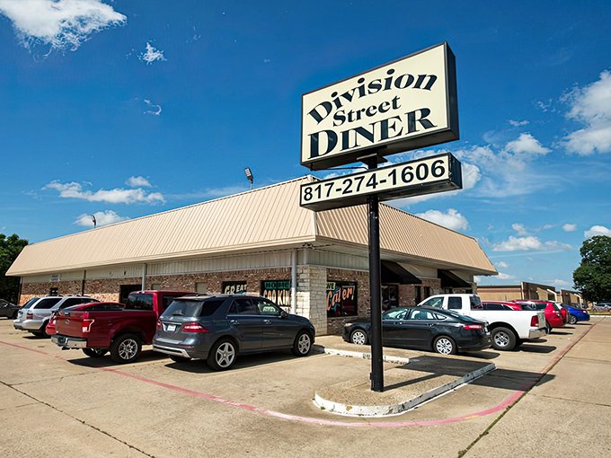 Division Street Diner's sign stands tall against the Texas sky &ndash; a landmark for those who know where real breakfast happens.