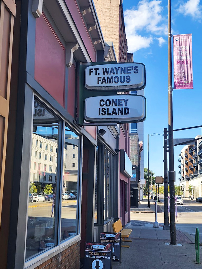 Fort Wayne's Famous Coney Island sign hangs proudly, a beacon for downtown lunch seekers.