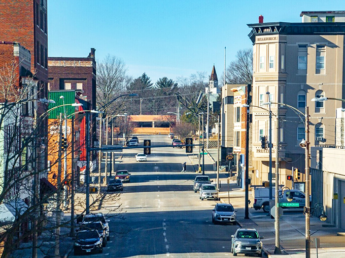 Morning light illuminates Freeport's classic main street, where affordable homes and friendly neighbors create an inviting community.