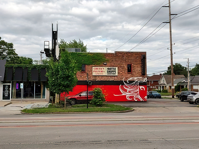 Greek's bold red wall and cheerful "Eat Happy!" message sets the perfect tone for pizza that delivers on that promise.
