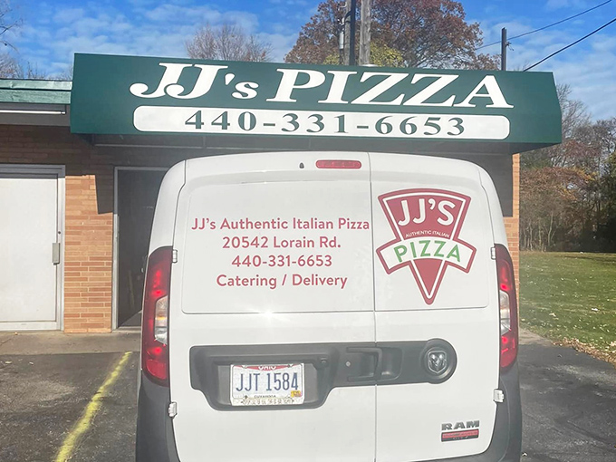 The delivery van tells the whole story - this pizza travels because people can't resist.