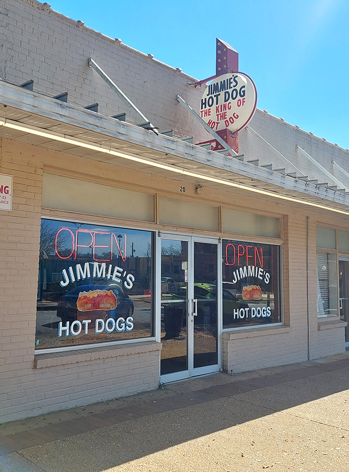 That classic neon sign has been guiding hot dog lovers home for generations - a true neighborhood beacon.