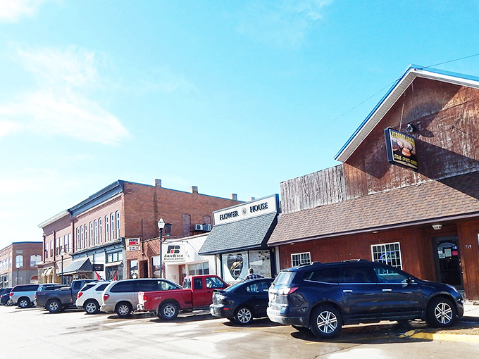 These historic Keosauqua buildings climb the bluffs like stepping stones to the past, each one a chapter in Iowa's river story.