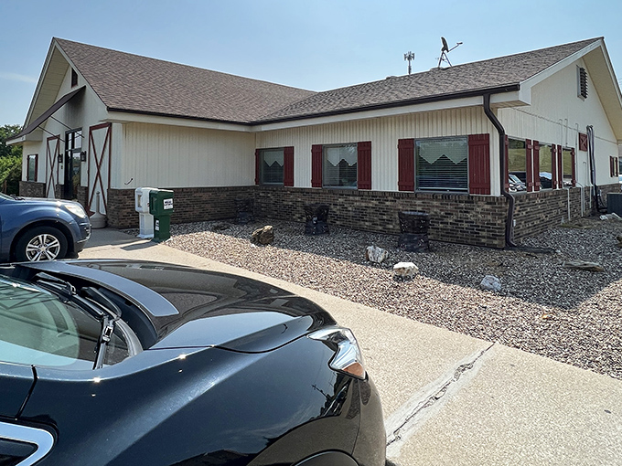 This charming barn-like exterior houses comfort food that would make even Tom Sawyer pause his adventures for a proper meal.