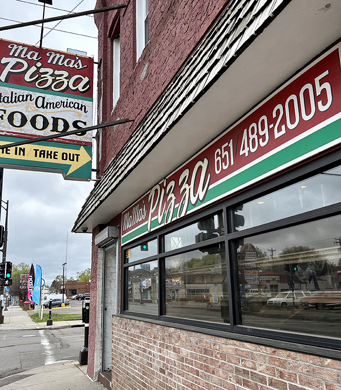 Mama's vintage sign against that distinctive pink building &ndash; a St. Paul pizza institution that time forgot (thankfully).