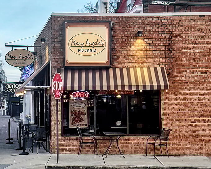 Mary Angela's corner spot with striped awnings looks like it was teleported straight from a Brooklyn street corner. Pizza authenticity guaranteed!