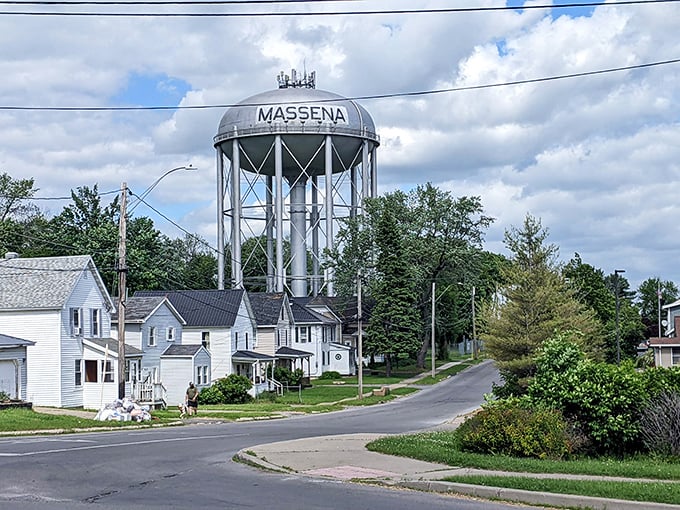Massena's water tower stands sentinel over a town where your retirement dollars stretch beautifully.