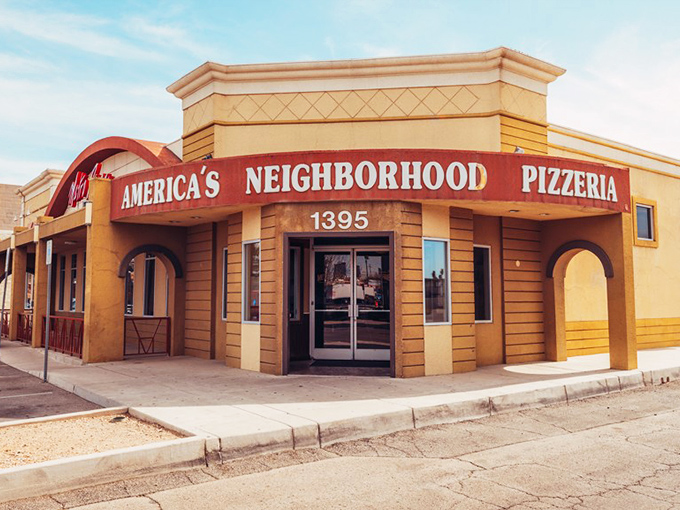 The sunshine-yellow building with "America's Neighborhood Pizzeria" isn't just a sign&mdash;it's a promise kept.
