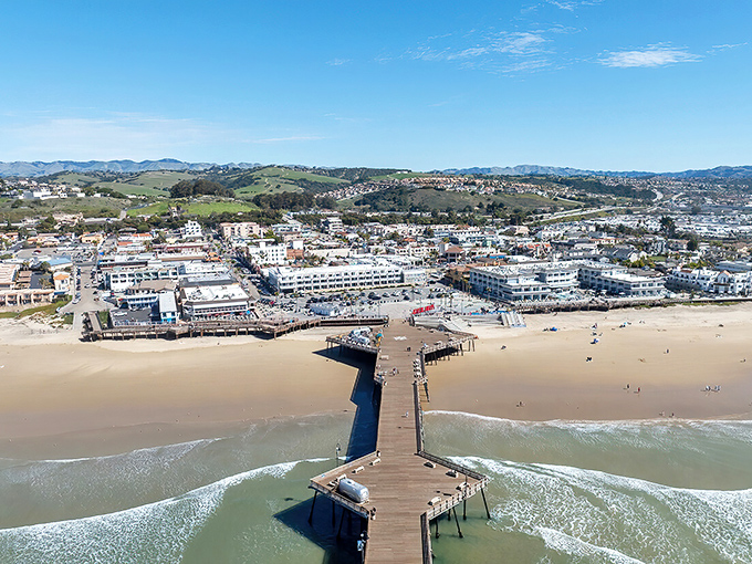 Pismo Beach's classic pier extends into endless blue like a wooden highway to nowhere.