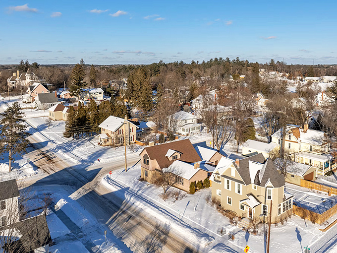 Rhinelander's winter wonderland showcases affordable homes nestled among pine trees, where retirement dollars stretch further in all seasons.