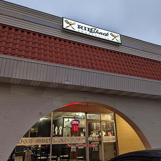 Those distinctive arched windows frame a barbecue destination where ribs reign supreme and hungry people find pure joy.