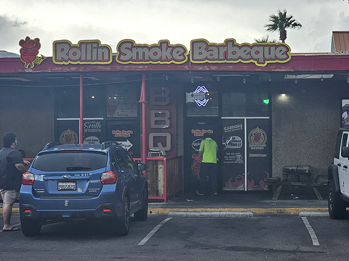 Rollin Smoke's cartoon pig mascot greets hungry visitors &ndash; he's not worried about becoming the special of the day!